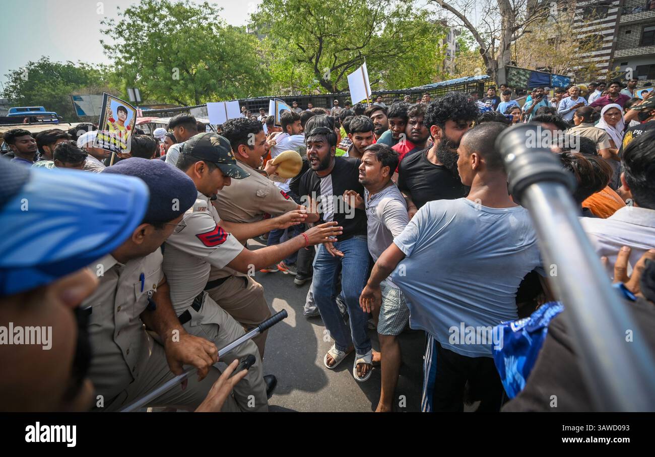 NEW DELHI, INDIA - APRIL 19: Local Residents of Seelampur area tries to ...