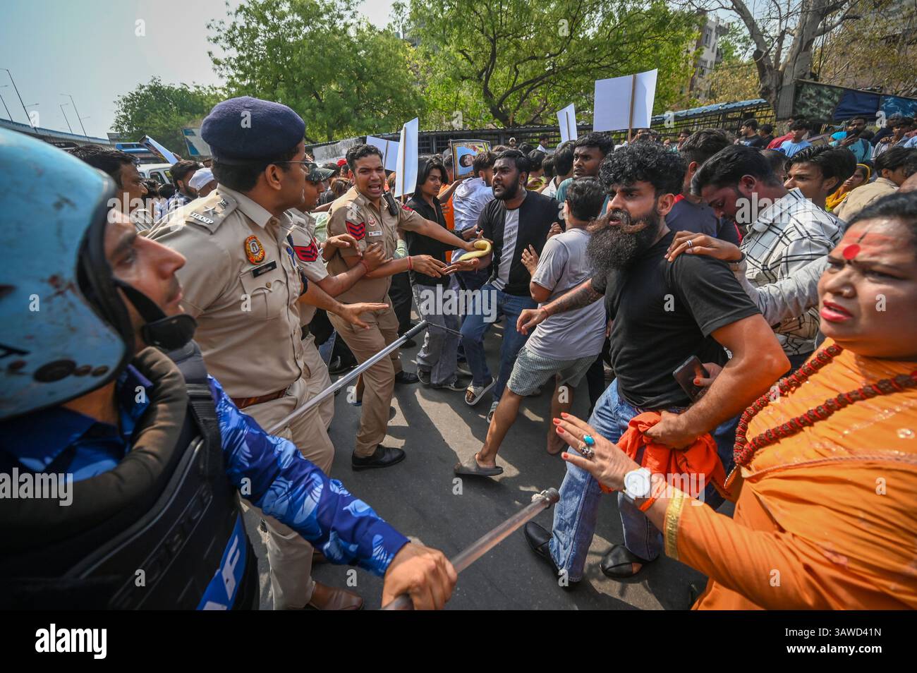 NEW DELHI, INDIA - APRIL 19: Local Residents of Seelampur area tries to ...
