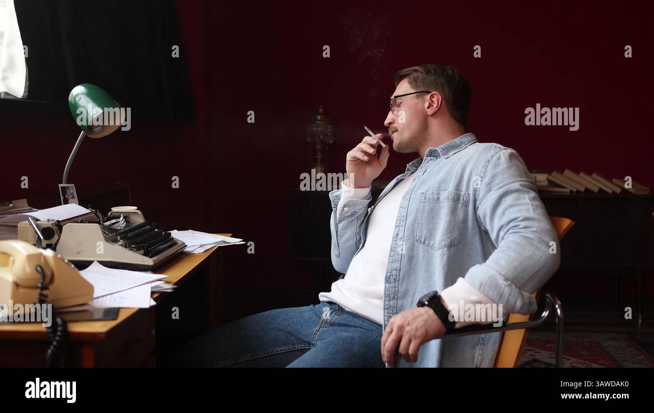 Cinematic shot of smoking journalist working intensely in vintage ...