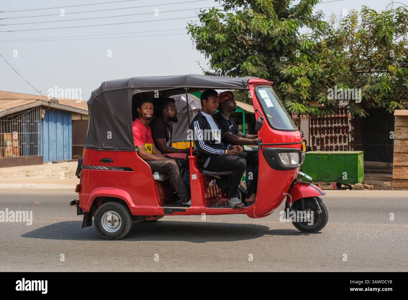 Ghana, Kumasi. Passengers in Three-wheeled Taxi Transport Stock Photo ...