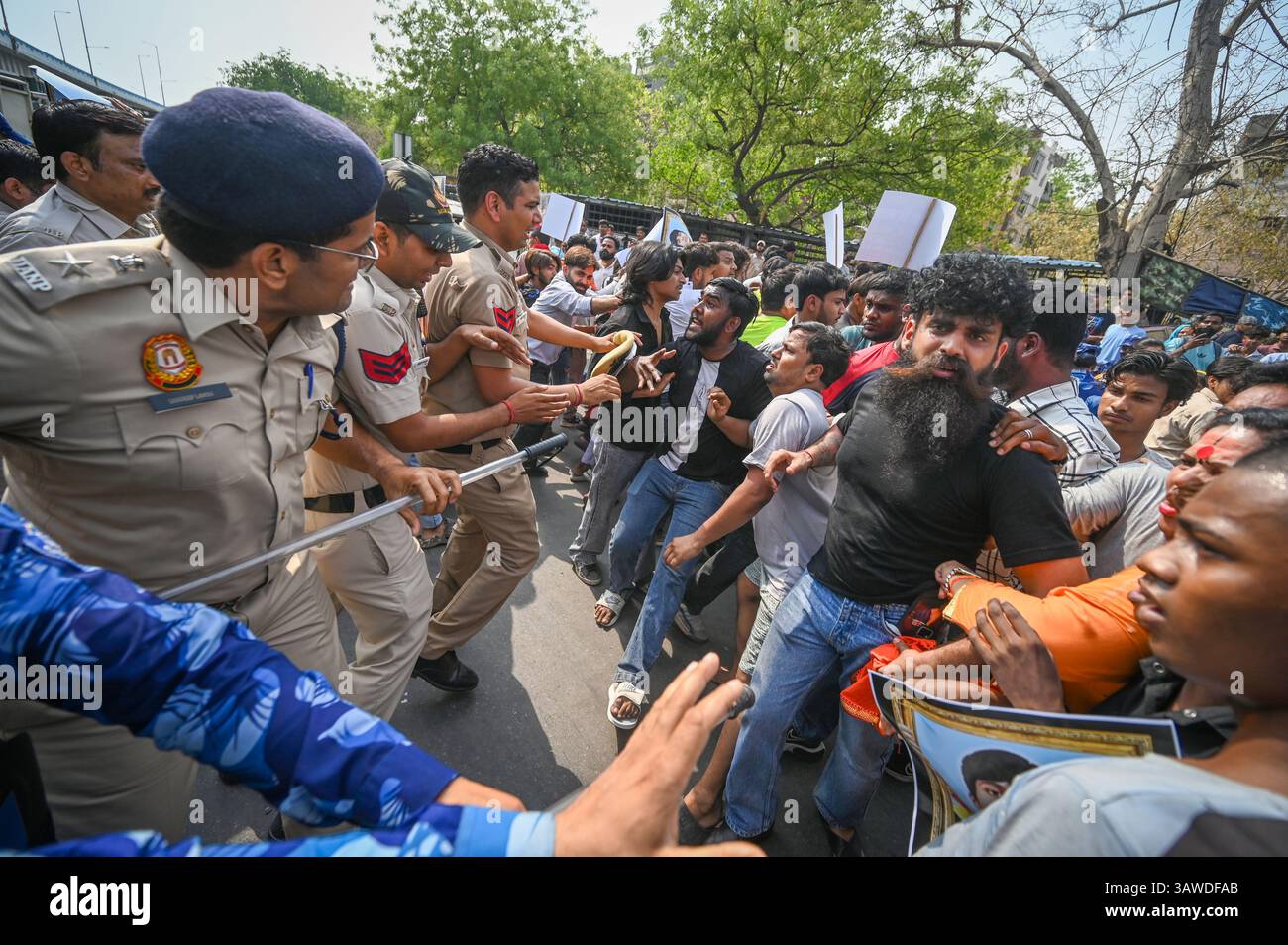NEW DELHI, INDIA - APRIL 19: Local Residents of Seelampur area tries to ...