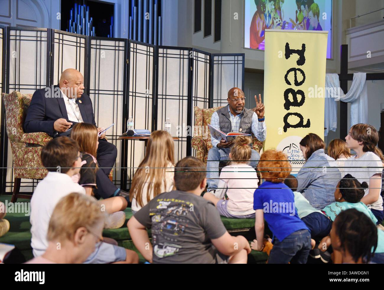 Charles Waters, Senator Raphael Warnock at a public appearance for ...