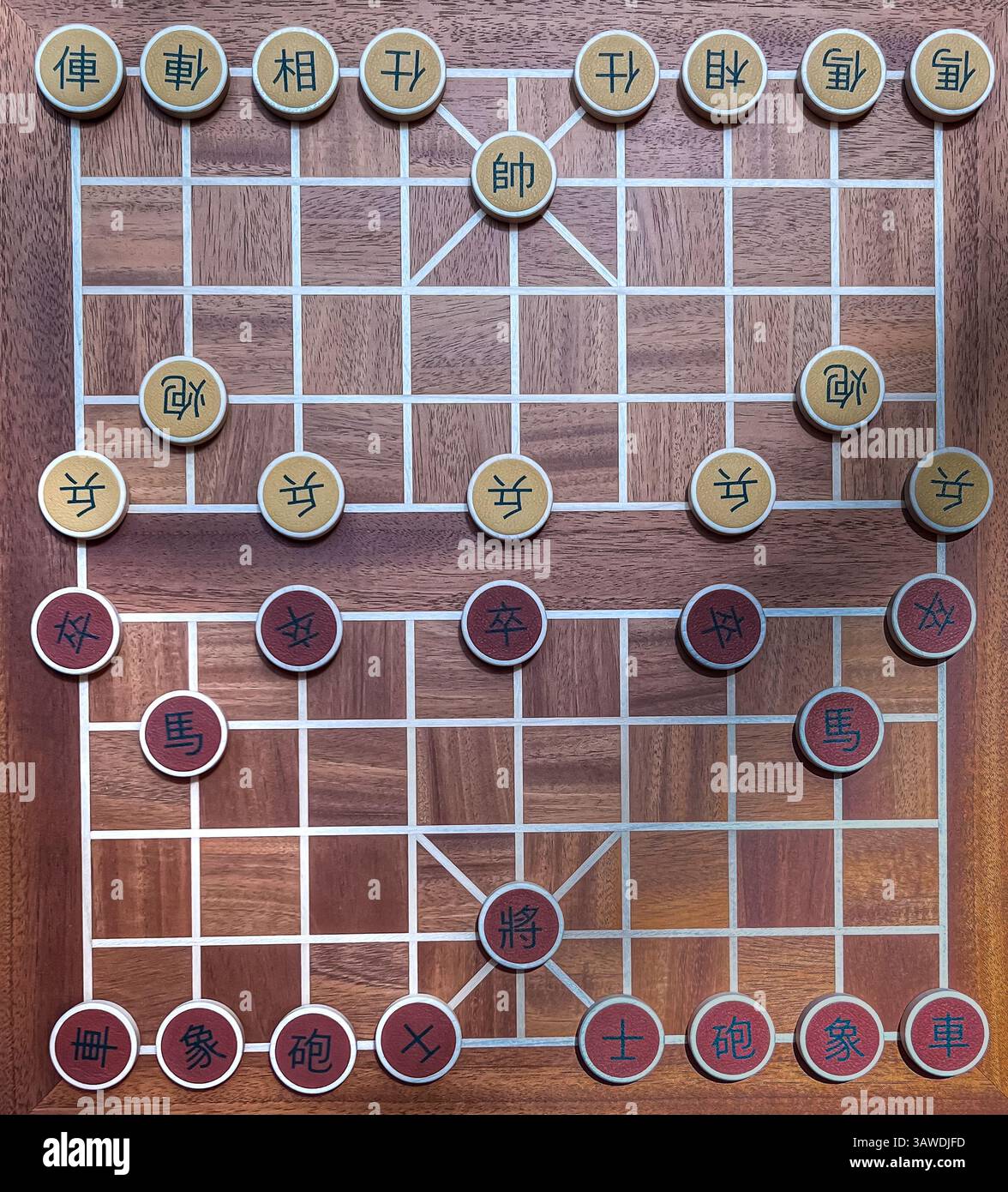 A traditional Xiangqi (Chinese chess) board set, featuring intricately ...