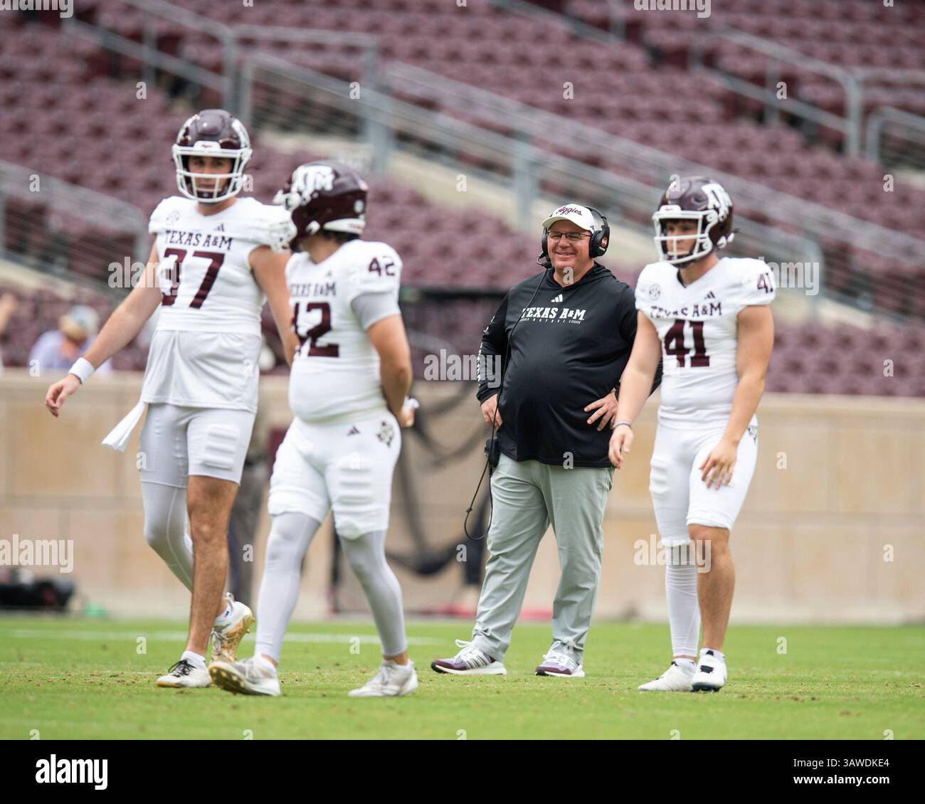 Texas A&M head coach Mike Elko, second from right, watches special ...