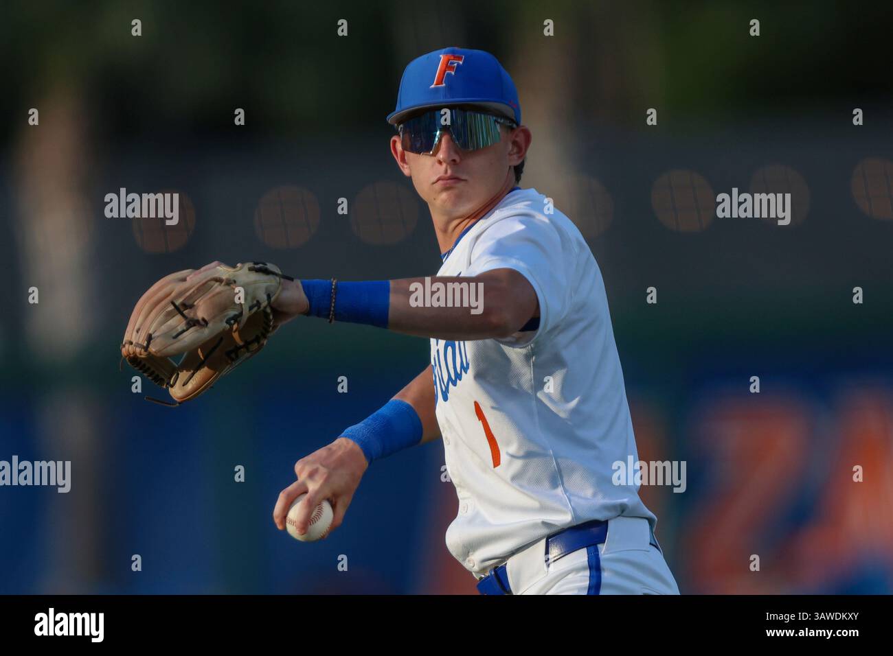 Florida infielder Justin Nadeau (1) warms up before an NCAA baseball ...