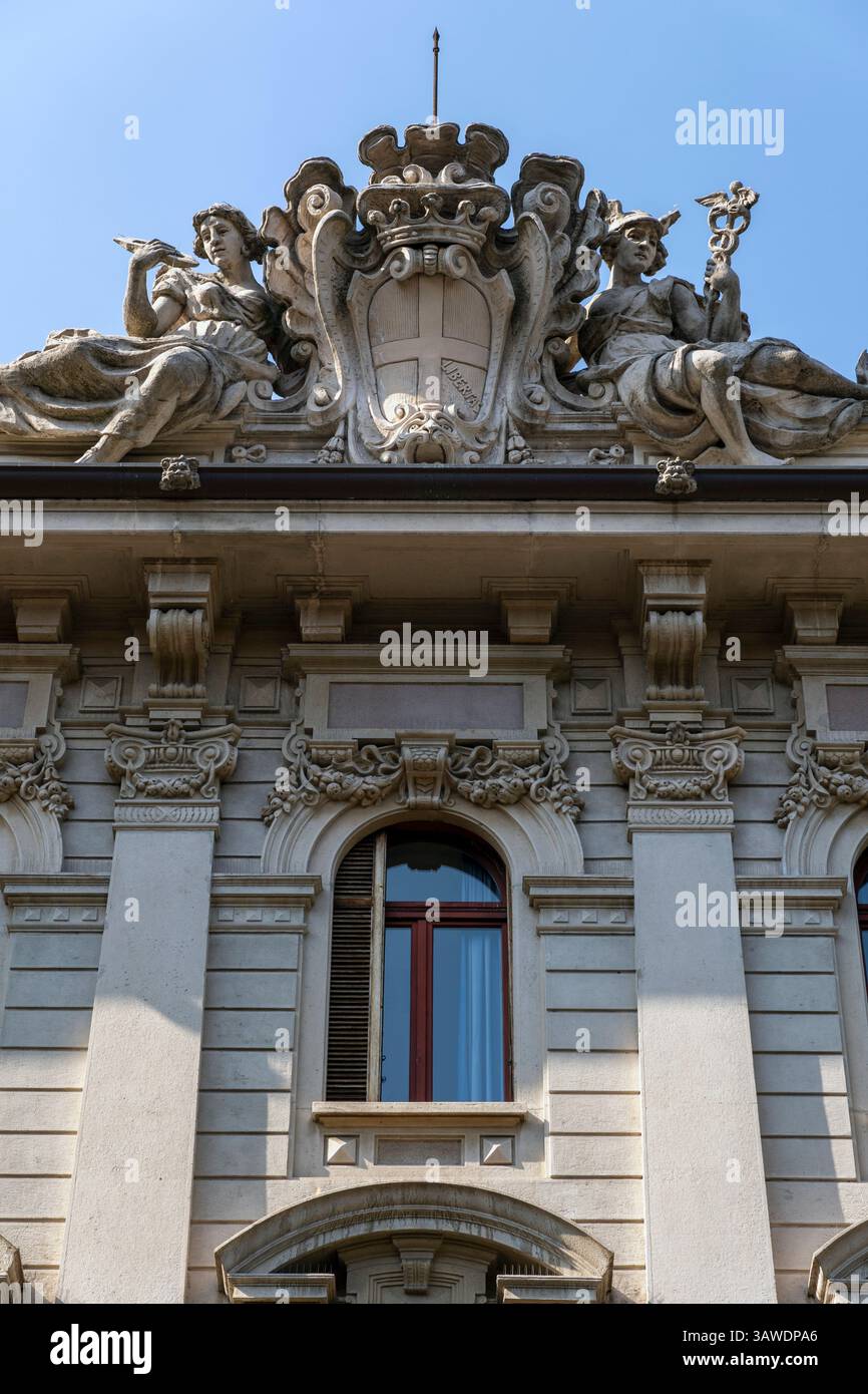 Como, Italy - April 4, 2025: Coat of arms of Milan on a building in the ...