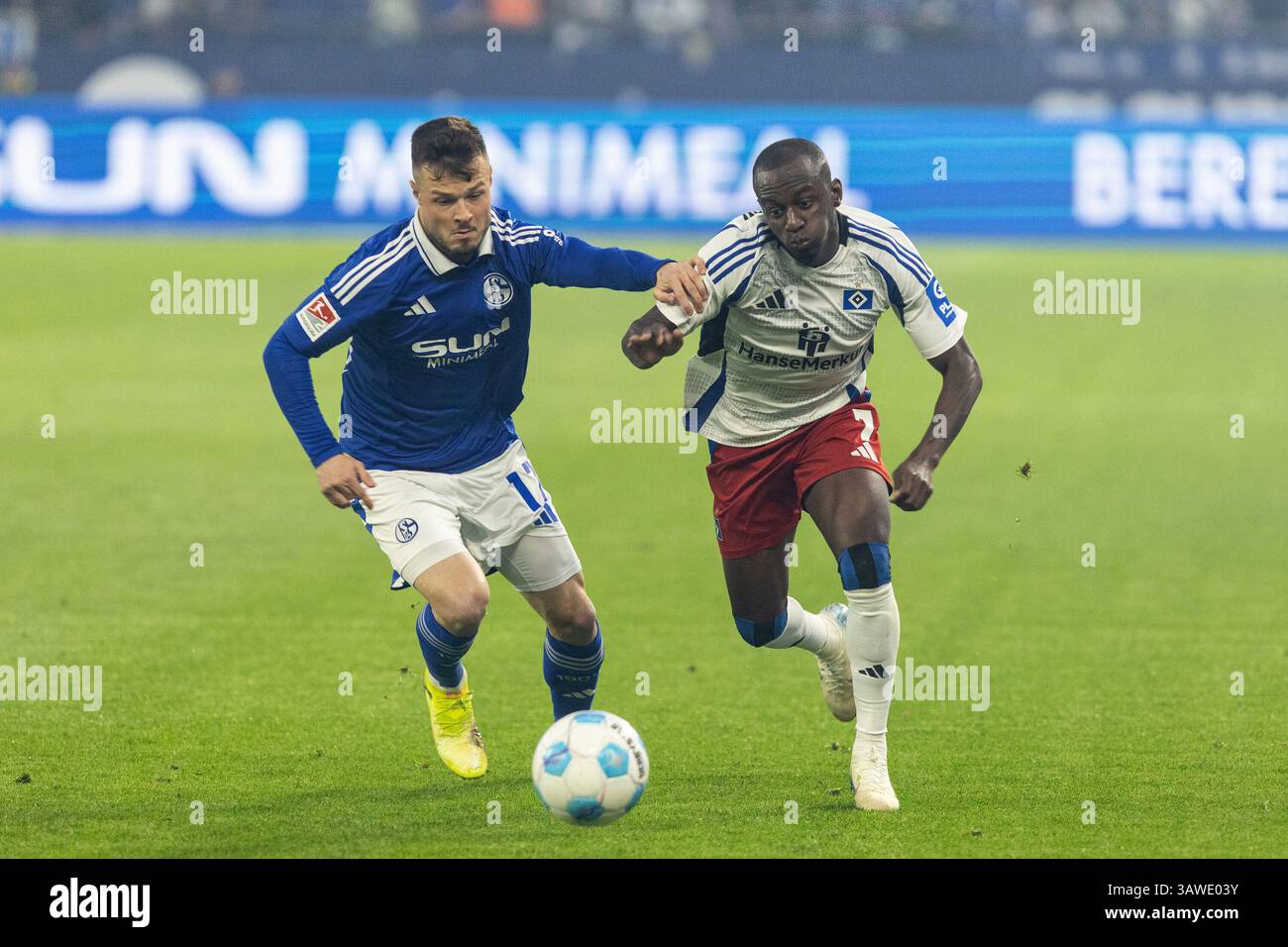 Gelsenkirchen, Deutschland. 19th Apr, 2025. Jean-Luc Dompe (Hamburger SV, 7), Adrian Gantenbein ...