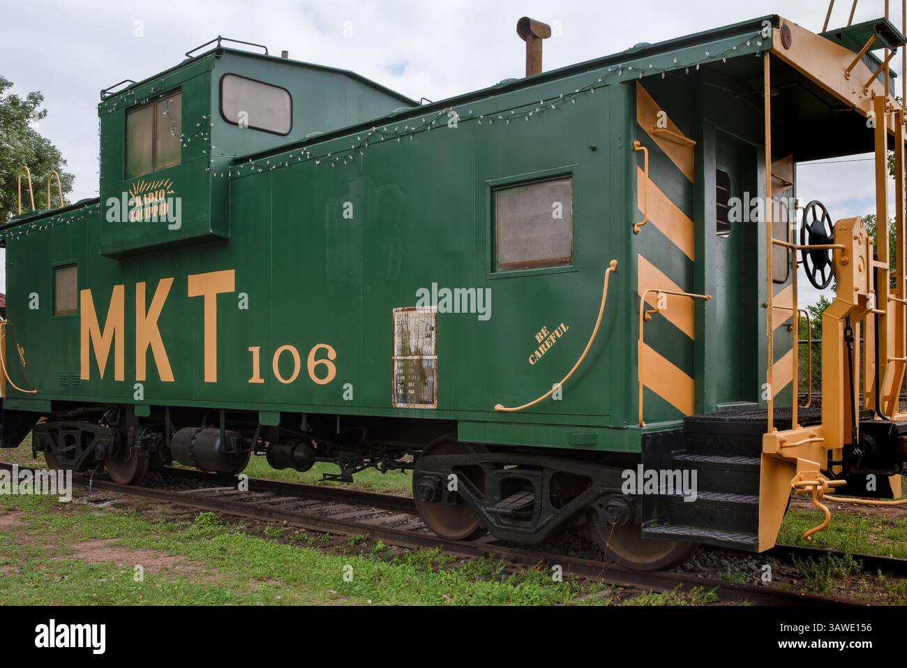 Green and yellow caboose for the Missouri-Kansas Texas Railroad at the ...
