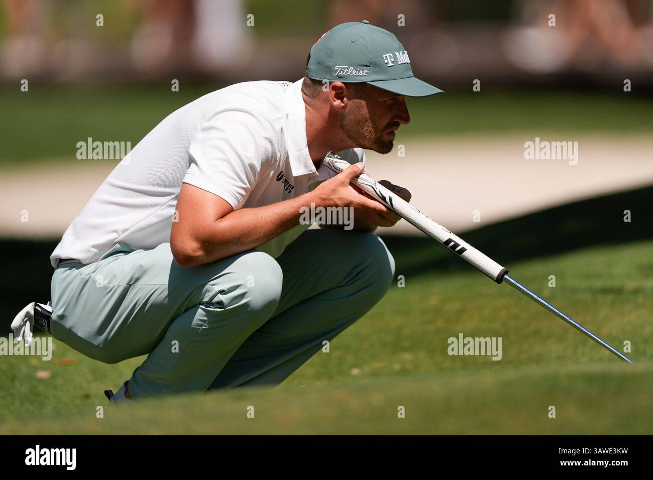 Wyndham Clark lines up his putt on the seventh green during the third ...