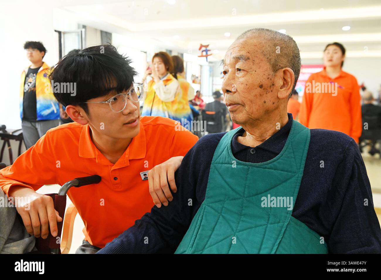 RIZHAO, CHINA - APRIL 19, 2025 - Elderly people are watching a ...