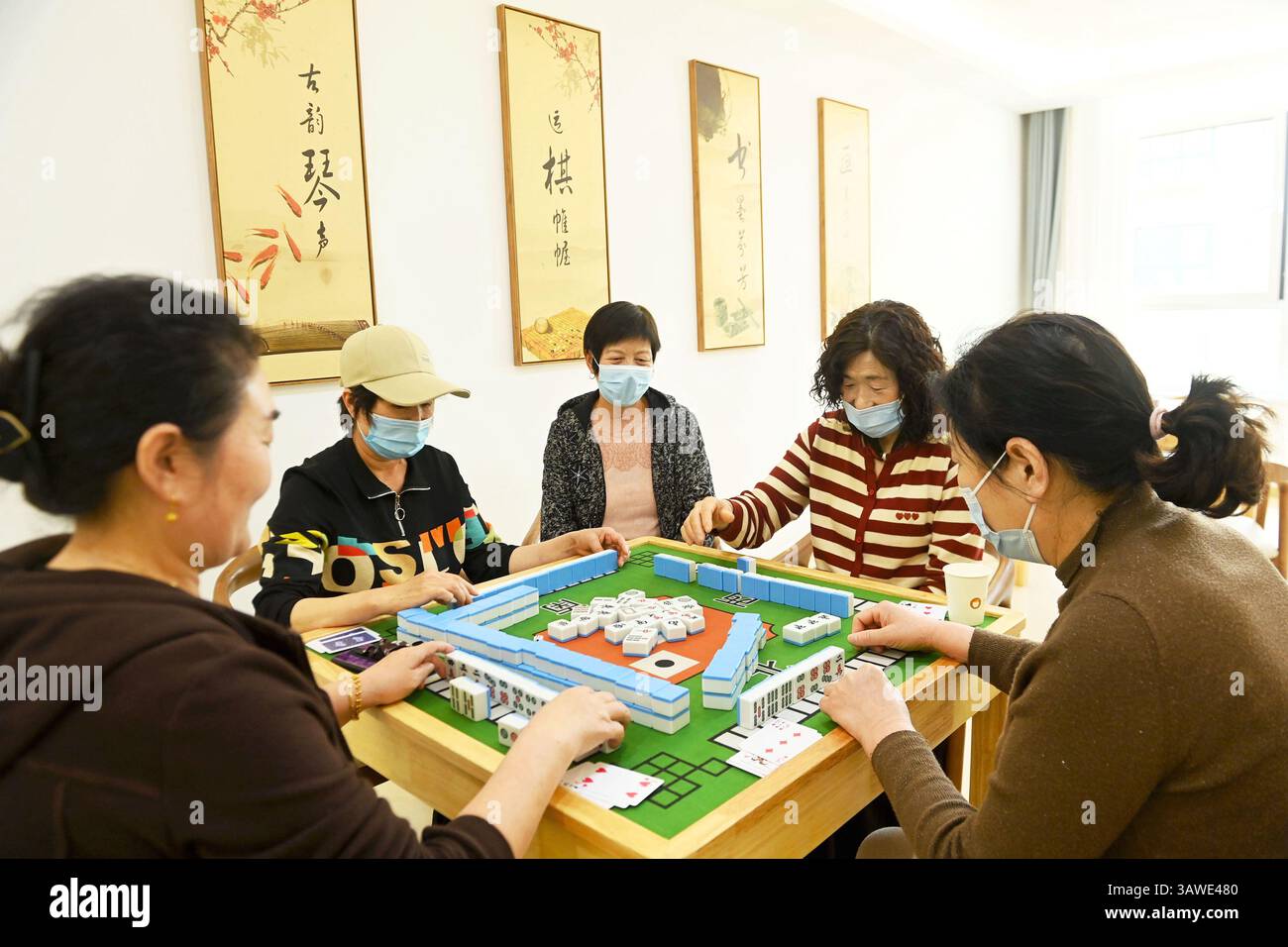 RIZHAO, CHINA - APRIL 19, 2025 - Elderly people are having fun in the ...