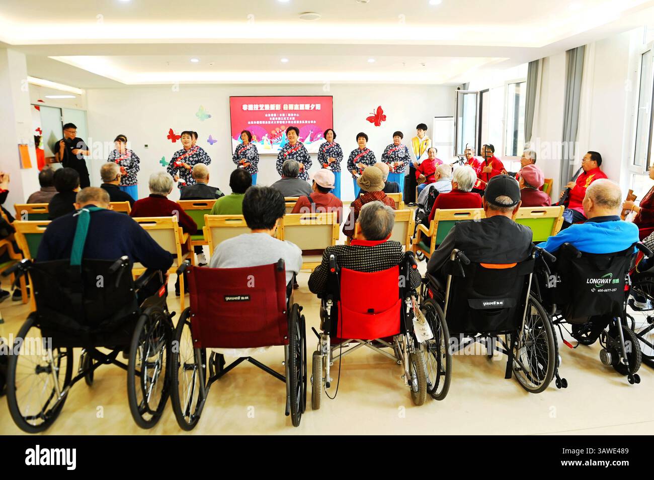 RIZHAO, CHINA - APRIL 19, 2025 - Elderly people are watching a ...