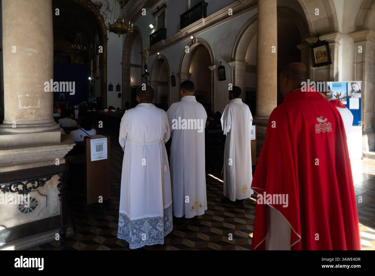 Salvador, Bahia, Brazil - April 18, 2025: Catholics are seen entering ...