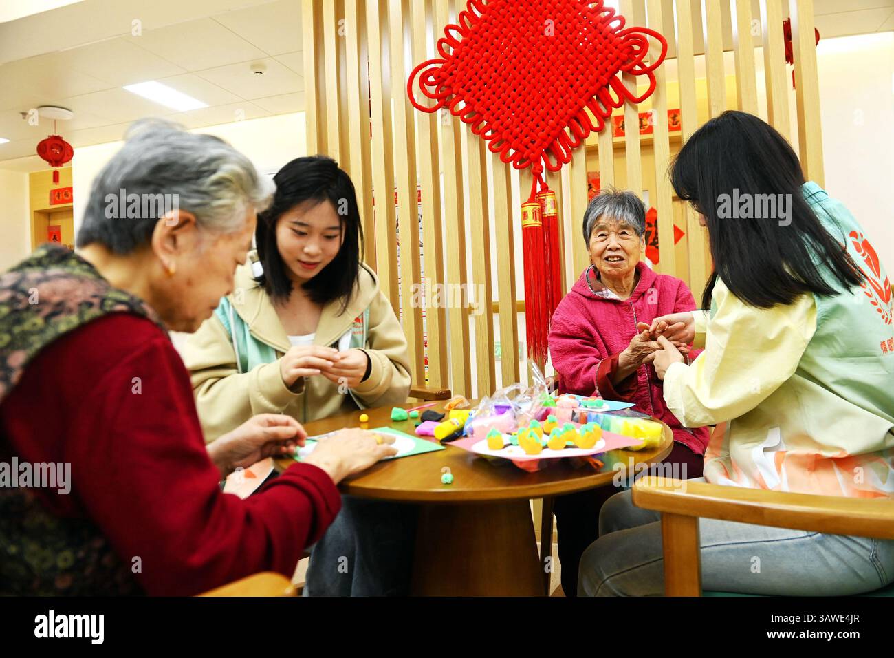 RIZHAO, CHINA - APRIL 19, 2025 - Volunteers are accompanying the ...
