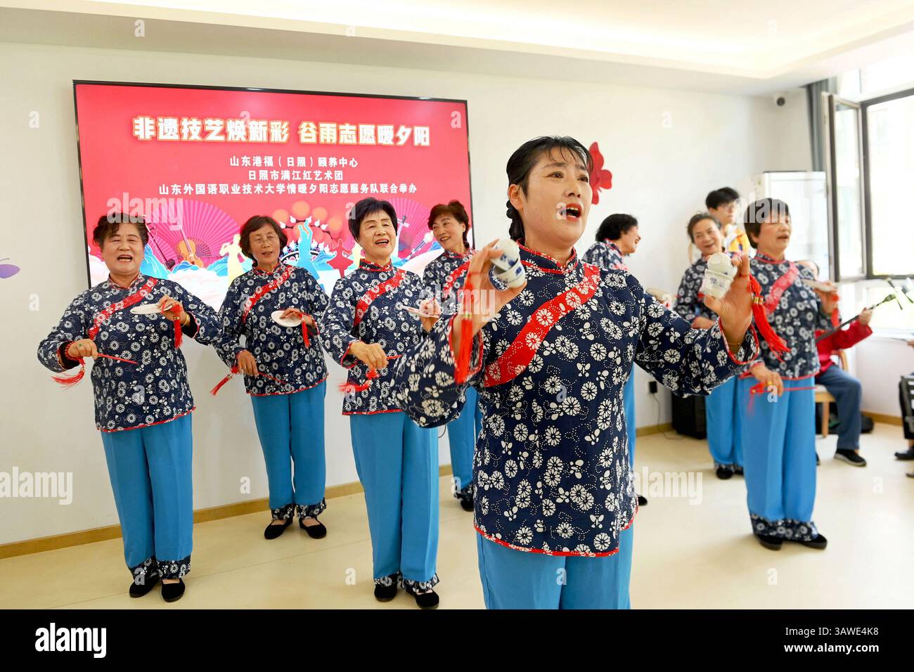 RIZHAO, CHINA - APRIL 19, 2025 - Elderly people are watching a ...