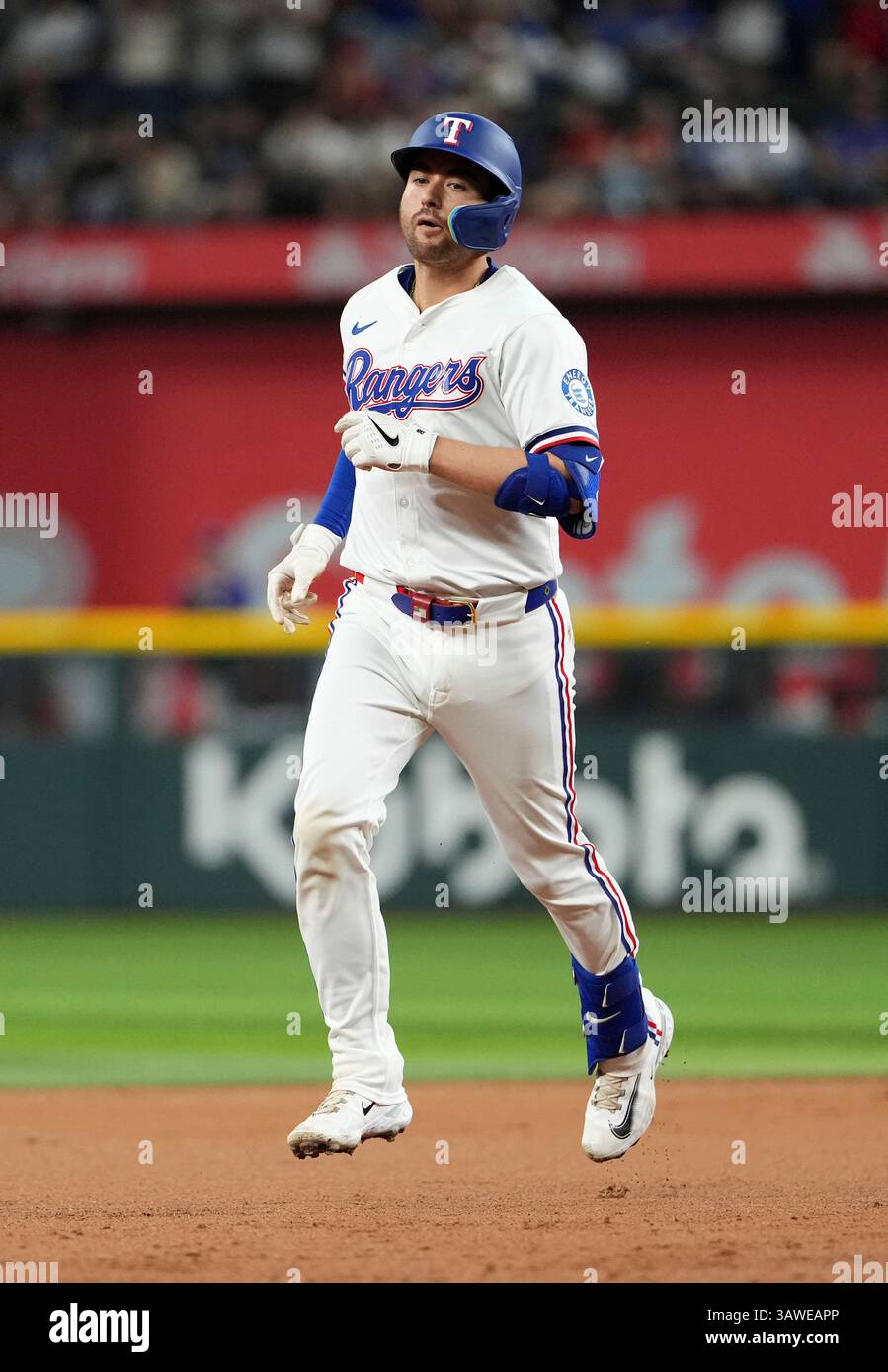 Texas Rangers' Kyle Higashioka rounds the bases on a two run home run ...