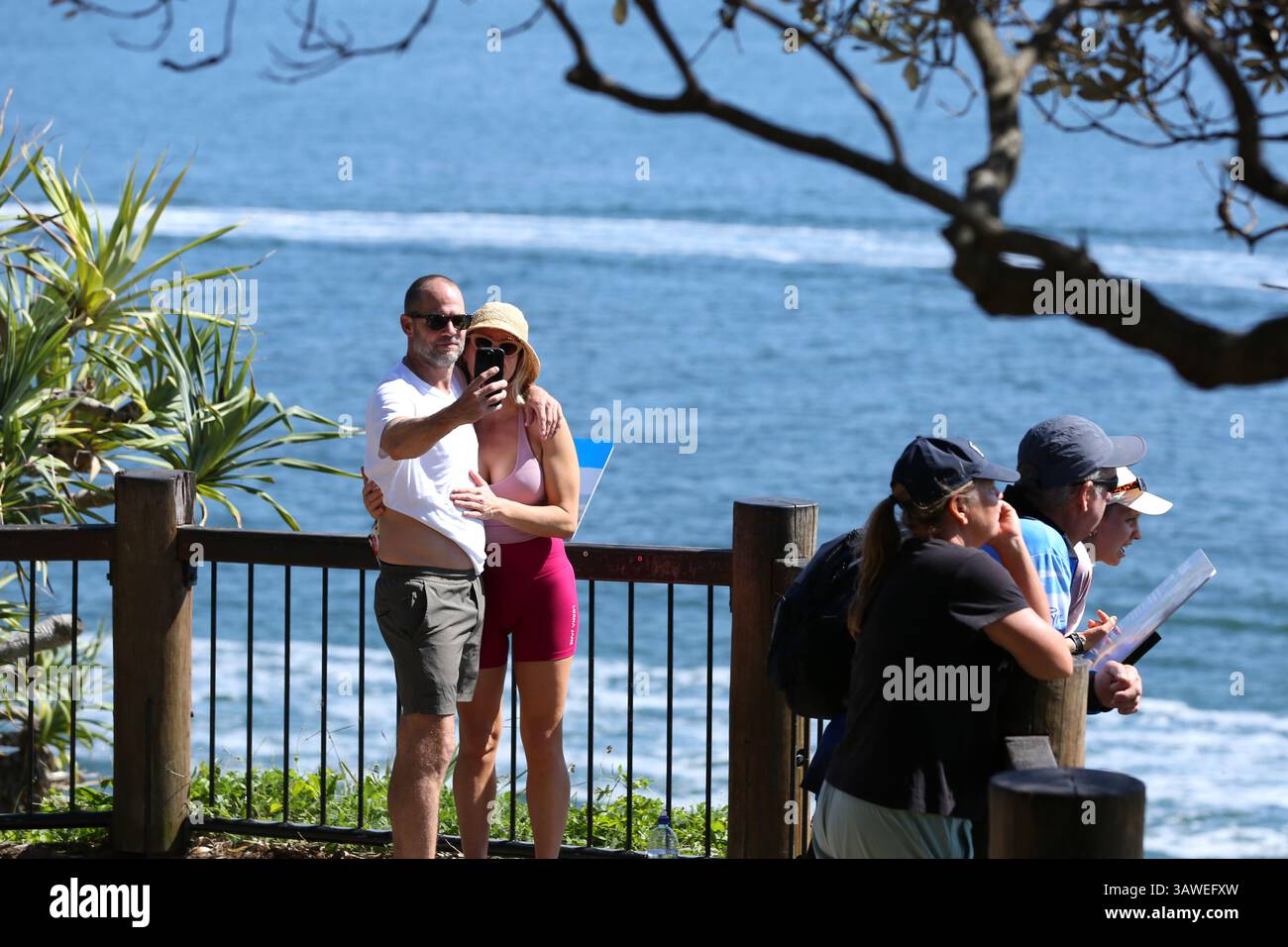 Visitors pose for photos at the Boiling Pot Lookout inside the Noosa ...