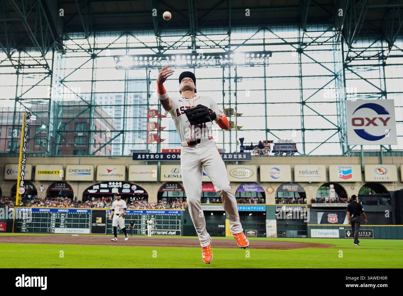 Houston Astros right fielder Cam Smith throws a ball to a fan during ...