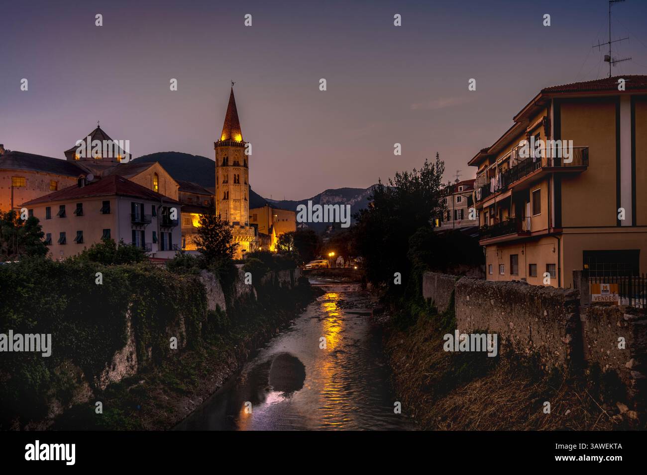 The medieval village of Finalborgo with the octagonal belltower of the ...