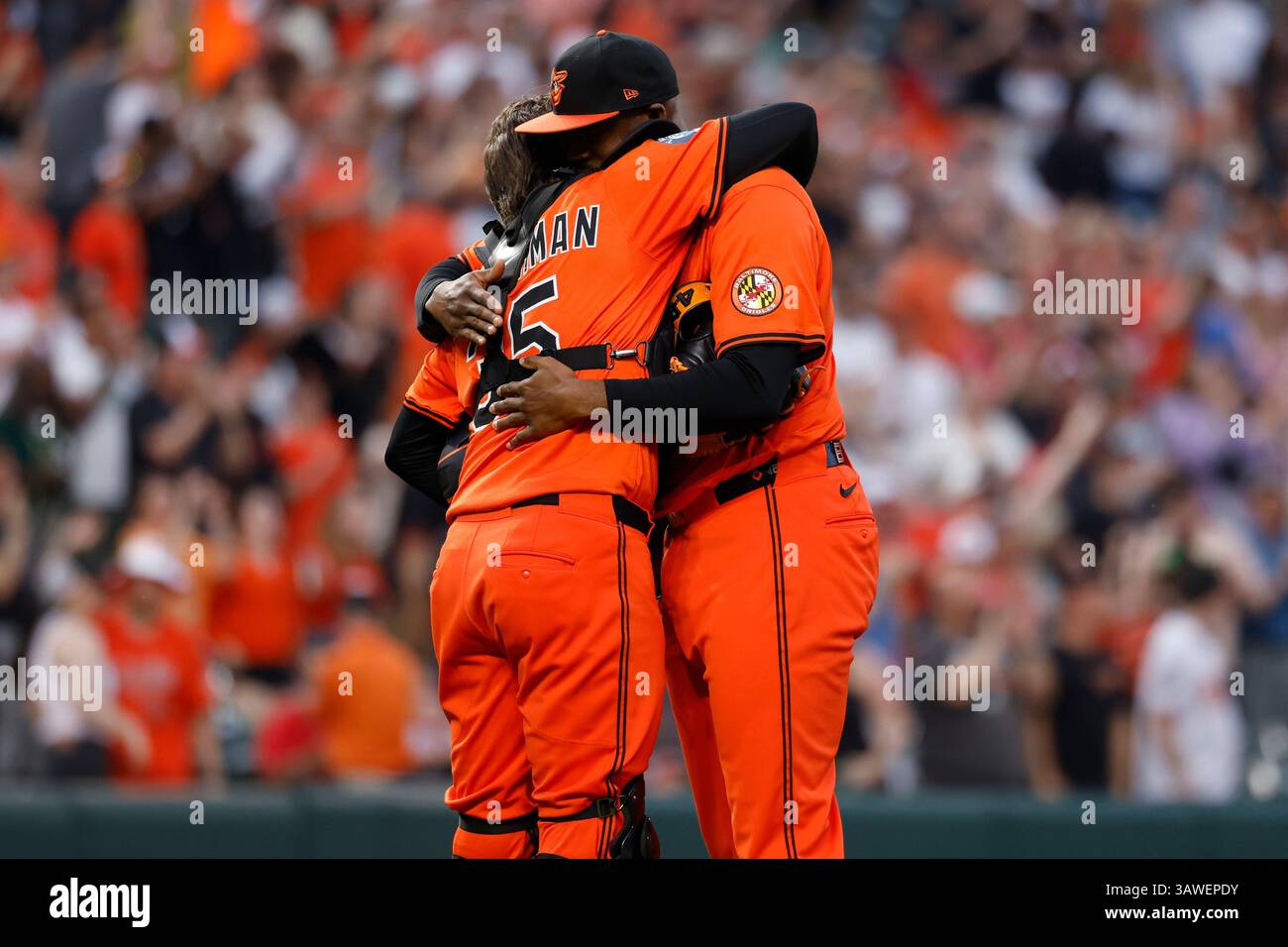Baltimore Orioles relief pitcher Felix Bautista, right, hugs catcher ...