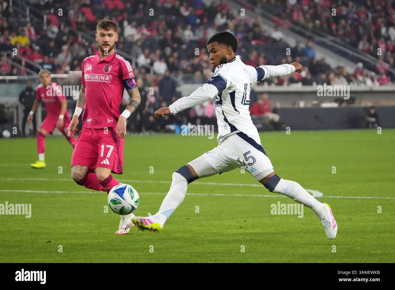 Vancouver Whitecaps' Pedro Vite (45) shoots as St. Louis City's Marcel ...