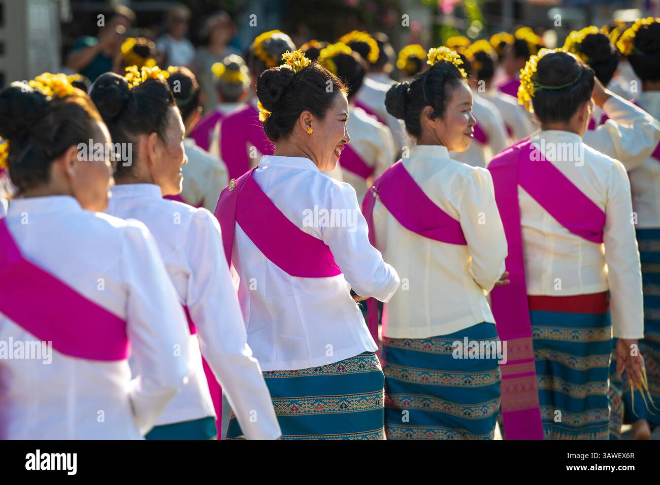 A Thai dancer seen smiling while preparing to perform the traditional ...