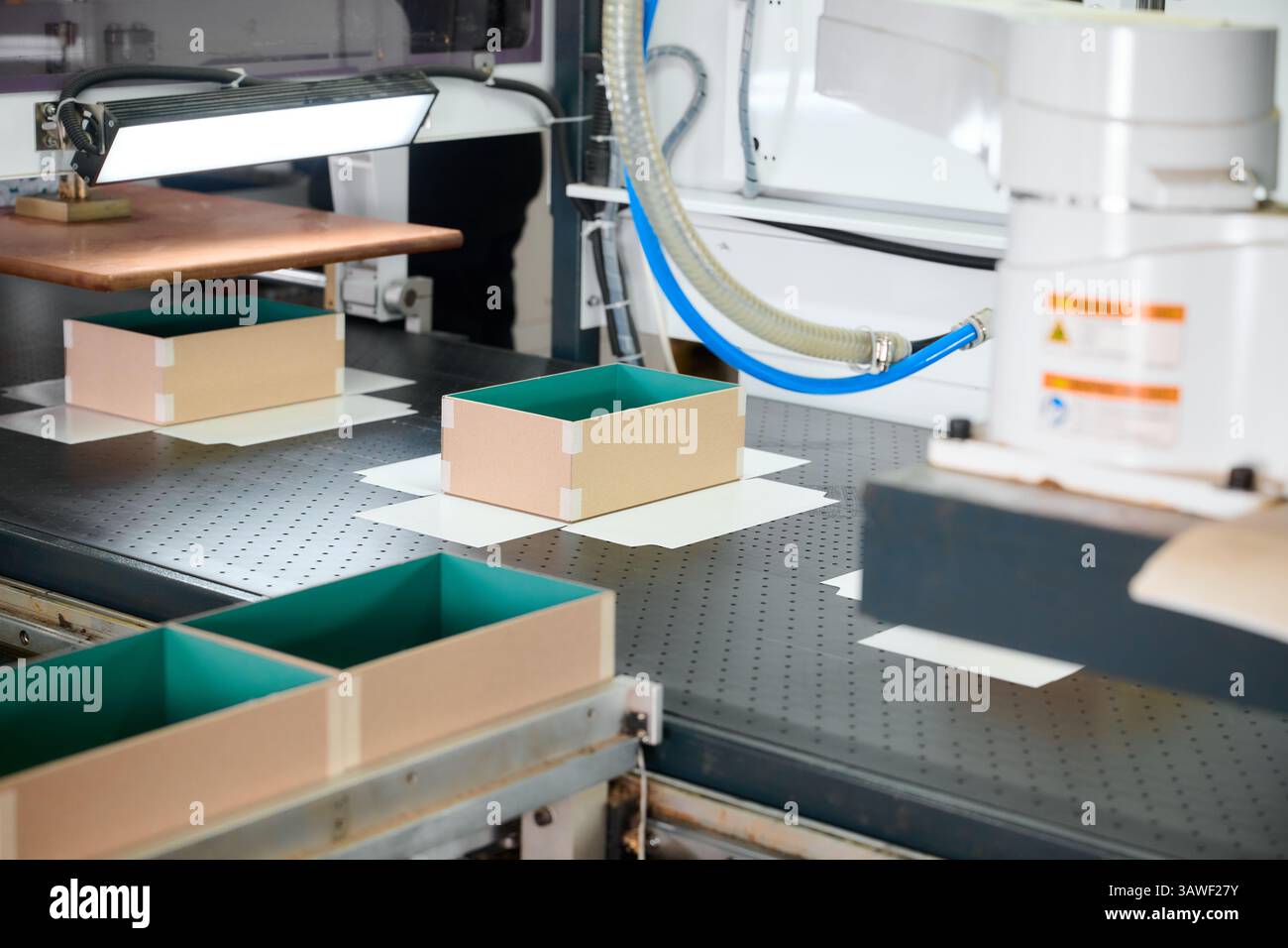 Innovative gluing process in a box manufacturing plant utilizing ...