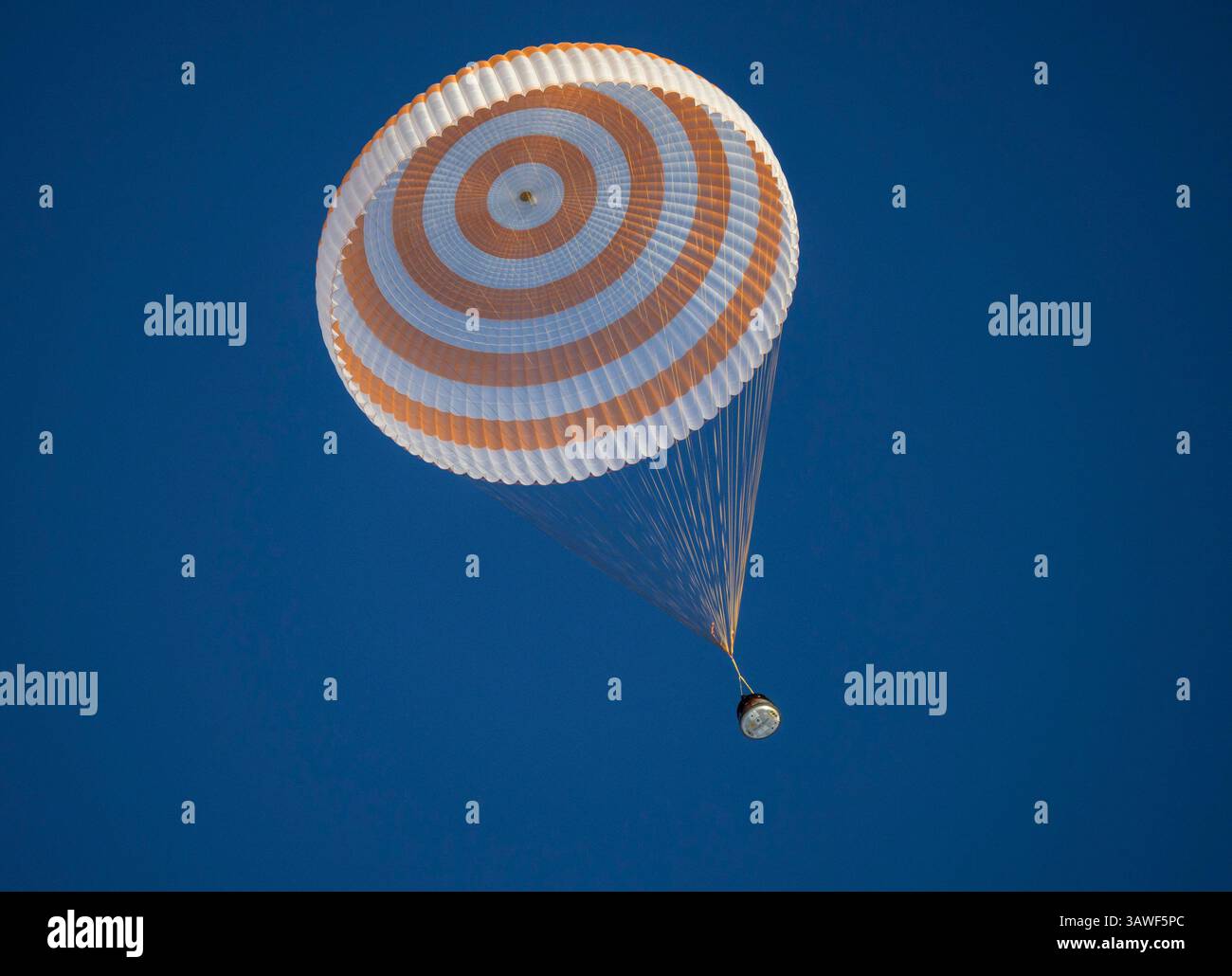 The Soyuz MS-26 spacecraft lands in a remote area near the town of ...