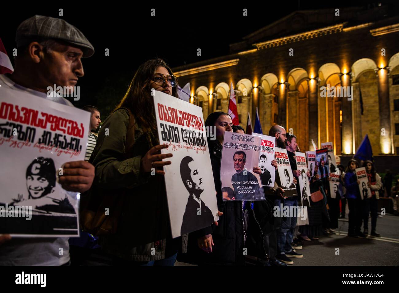 Tbilisi, Georgia, April 19, 2025. Demonstrators holding portraits of ...
