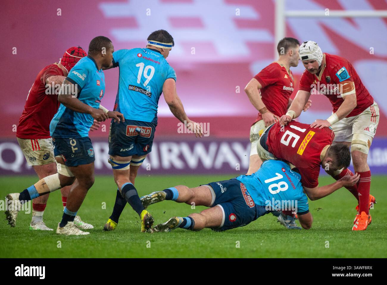 Limerick, Ireland. 20th Apr, 2025. Lee Barron of Munster tackled by ...