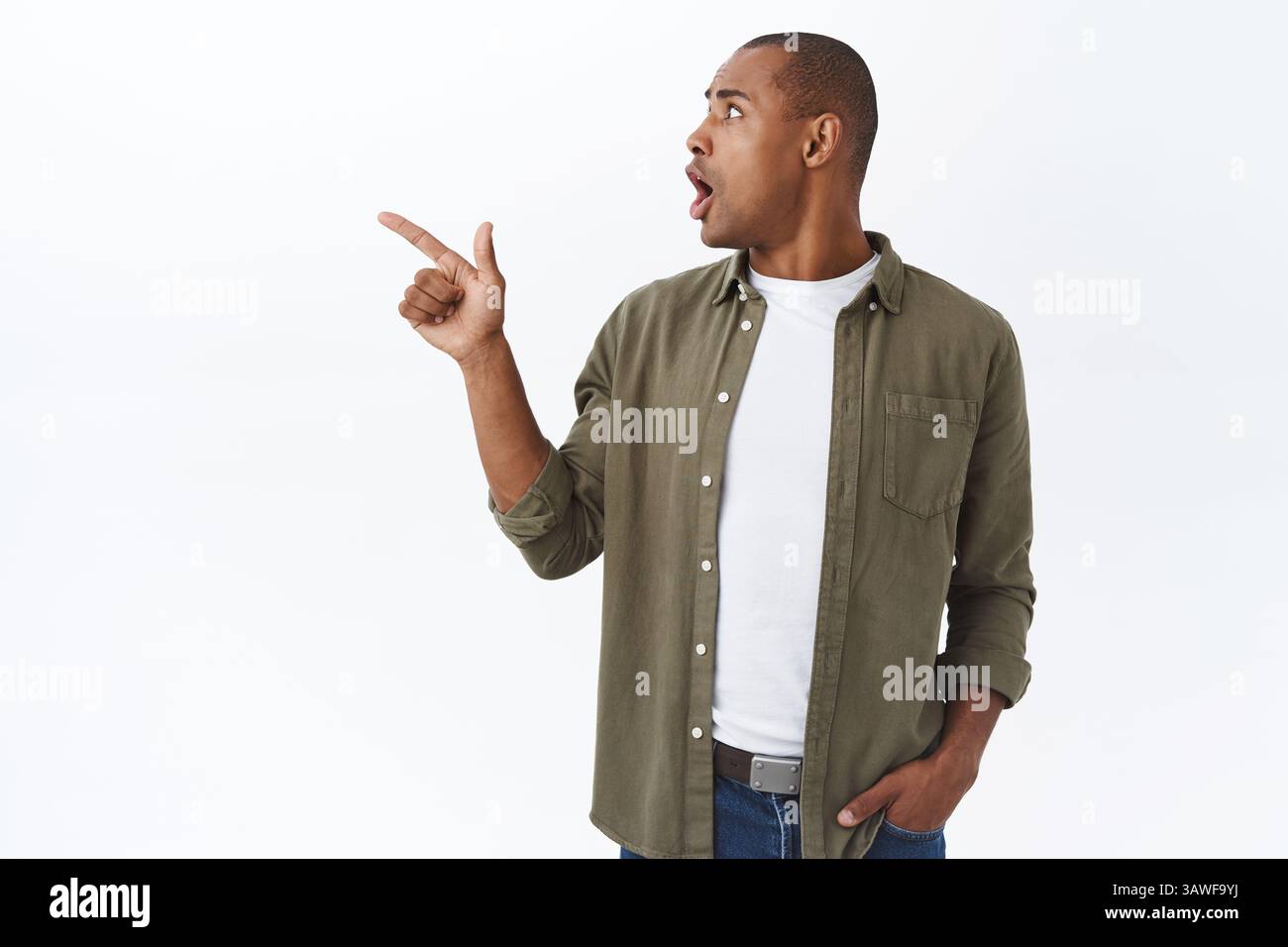 Portrait of shocked, alarmed african-american handsome guy looking ...