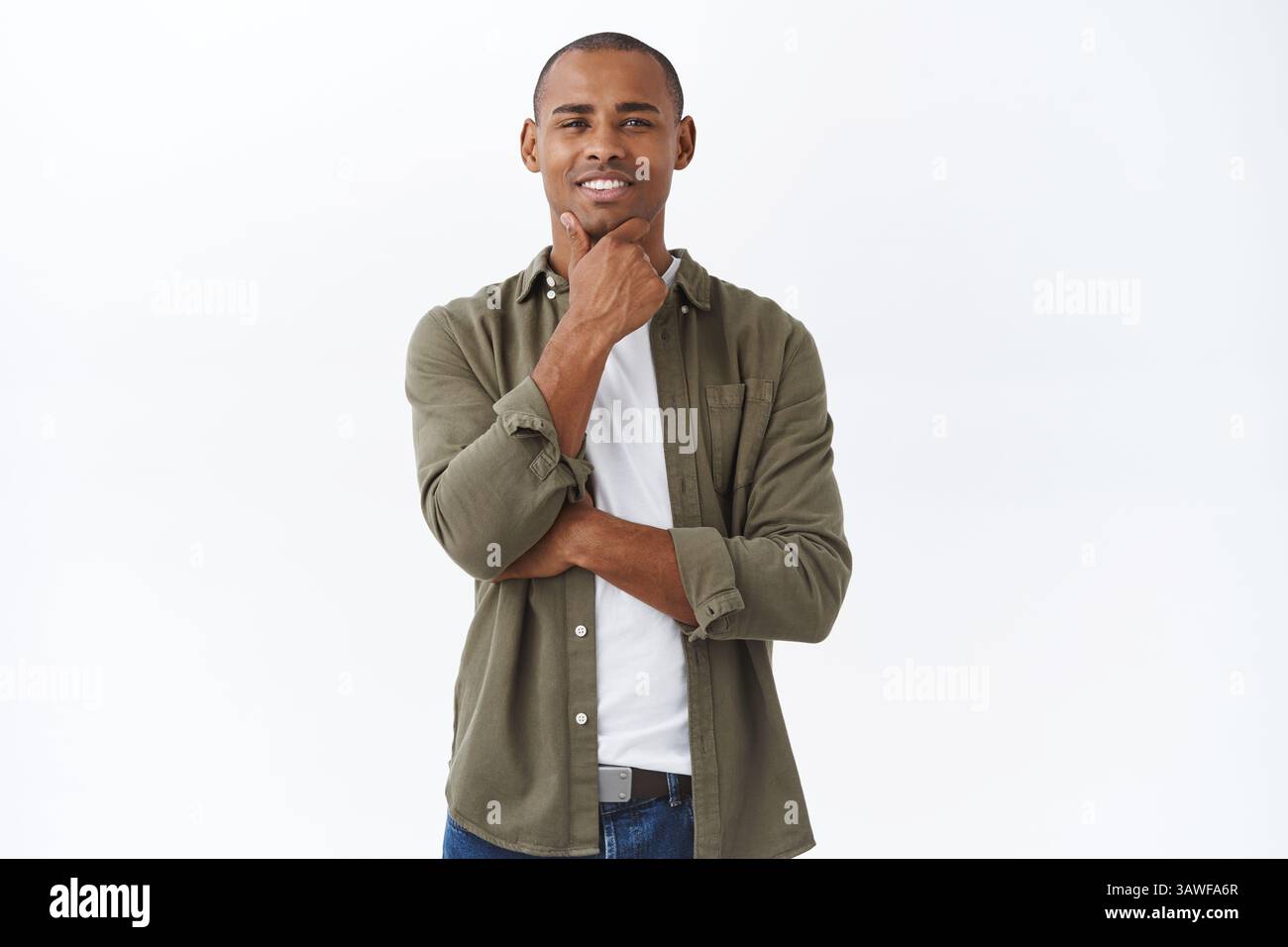 Very interesting. Portrait of intrigued african-american man, touch ...
