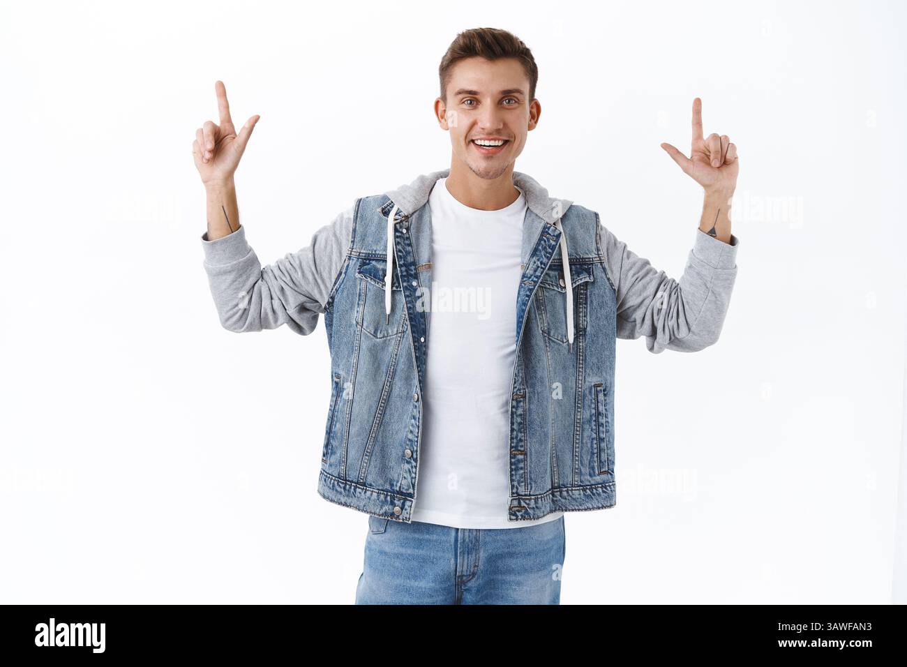 Handsome outgoing nice guy, gay man with blond hair, raise hands up ...