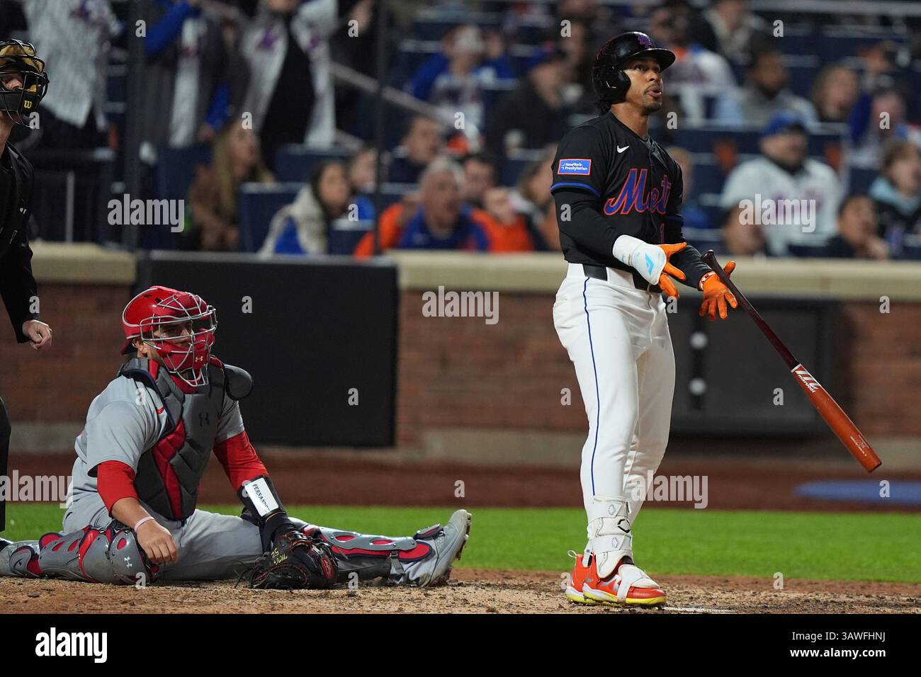 St. Louis Cardinals catcher Pedro Pagés, left, watches as New York Mets ...