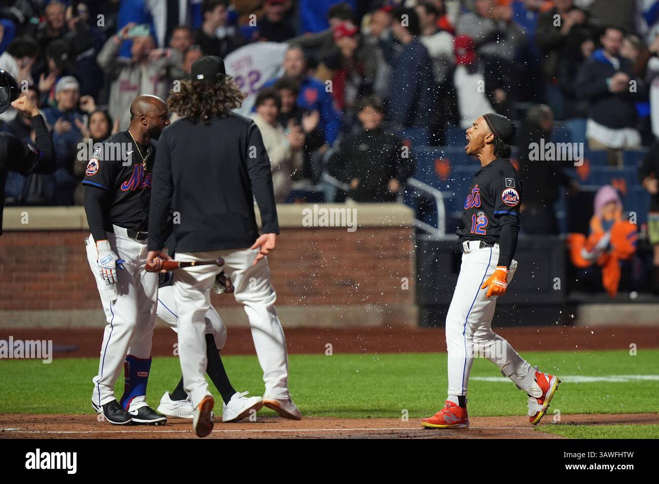 New York Mets' Francisco Lindor (12) celebrates as he runs the bases ...