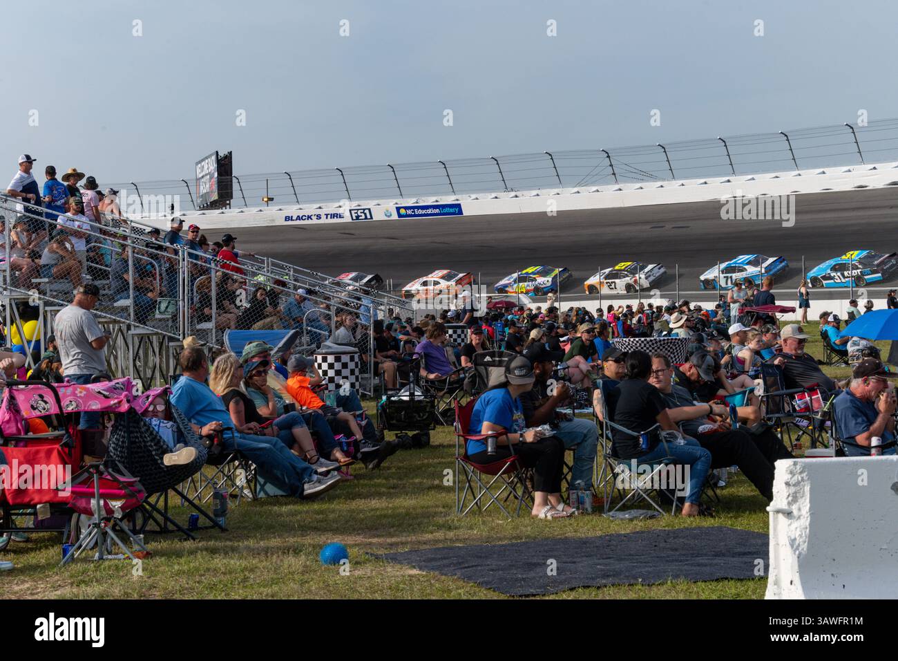 Rockingham, North Carolina, USA. 19th Apr, 2025. Fans watch from a ...