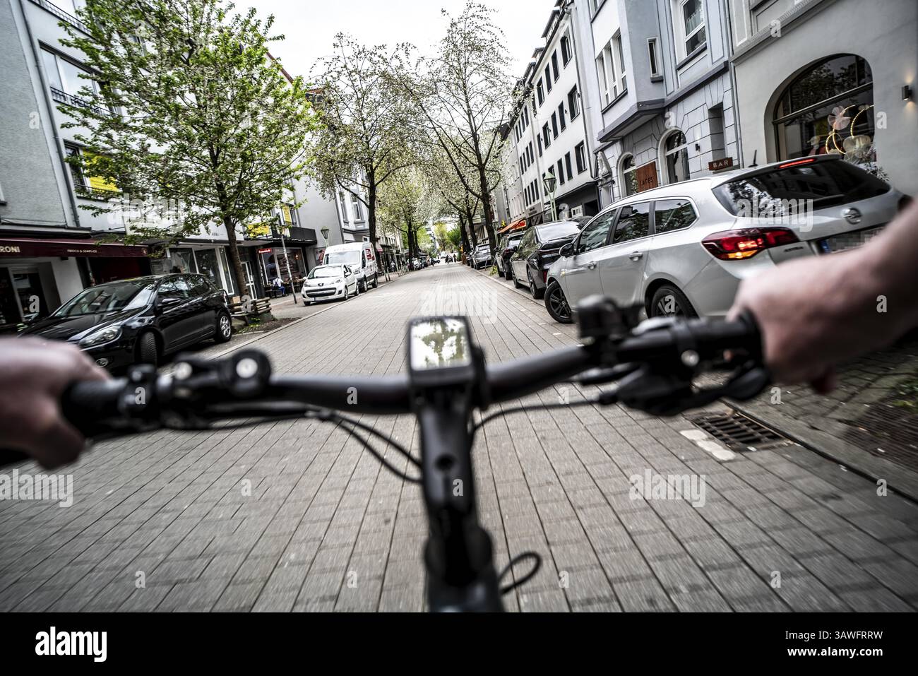 Cycling in the city, inner-city street, cycle lane, bicycles have ...