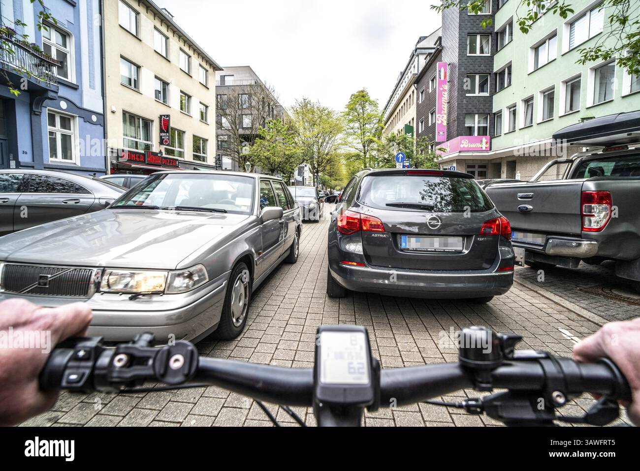 Cycling in the city, inner-city street, cycle lane, bicycles have ...
