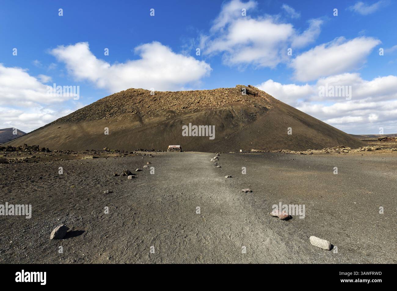 Hiking trail to the volcanic crater Caldera de Los Cuervos, cinder cone ...