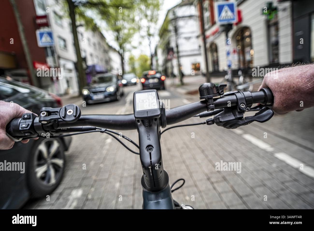 Cycling in the city, inner-city street, cycle lane, bicycles have ...
