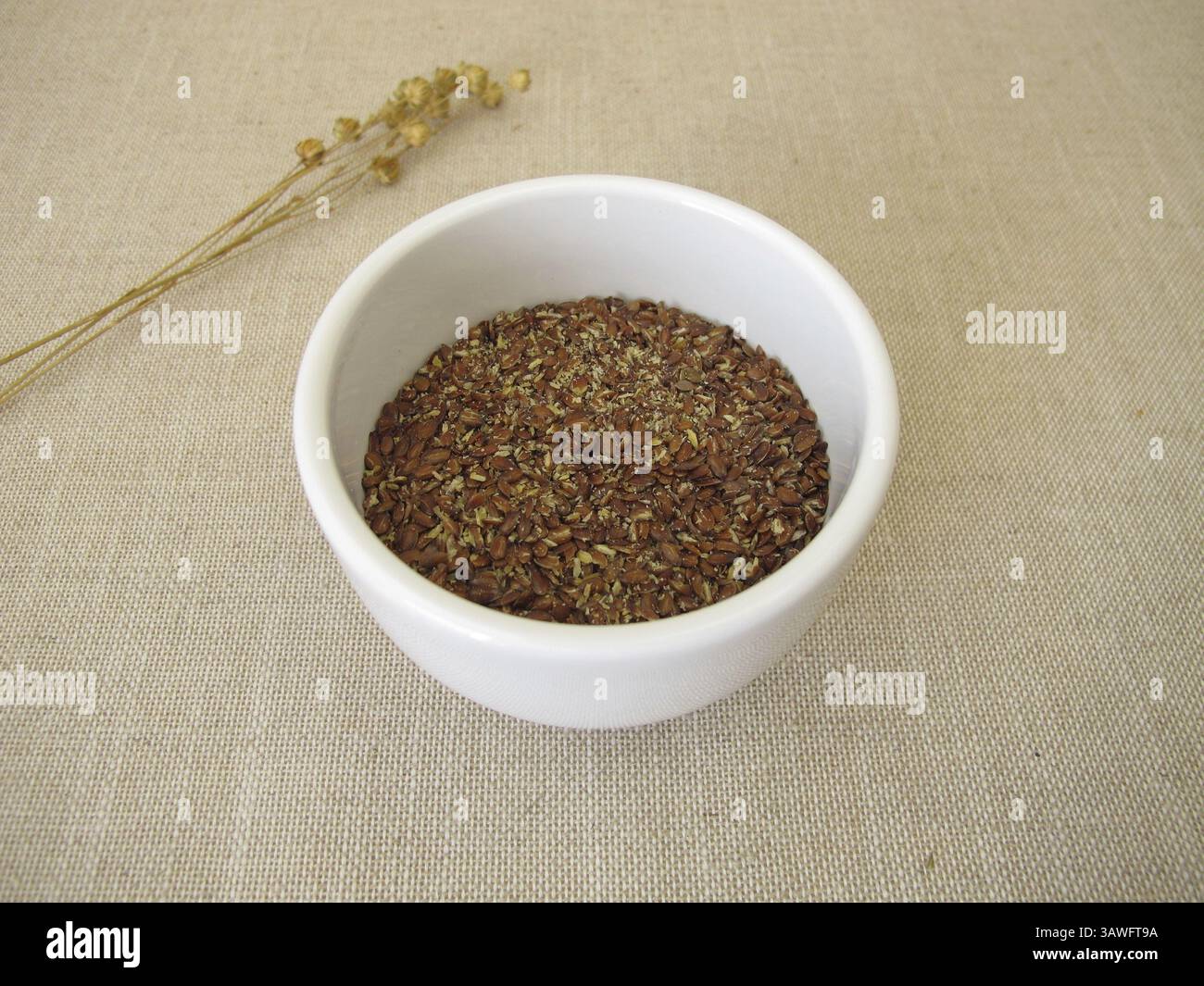 Crushed flax seeds ground linseed hi-res stock photography and images ...