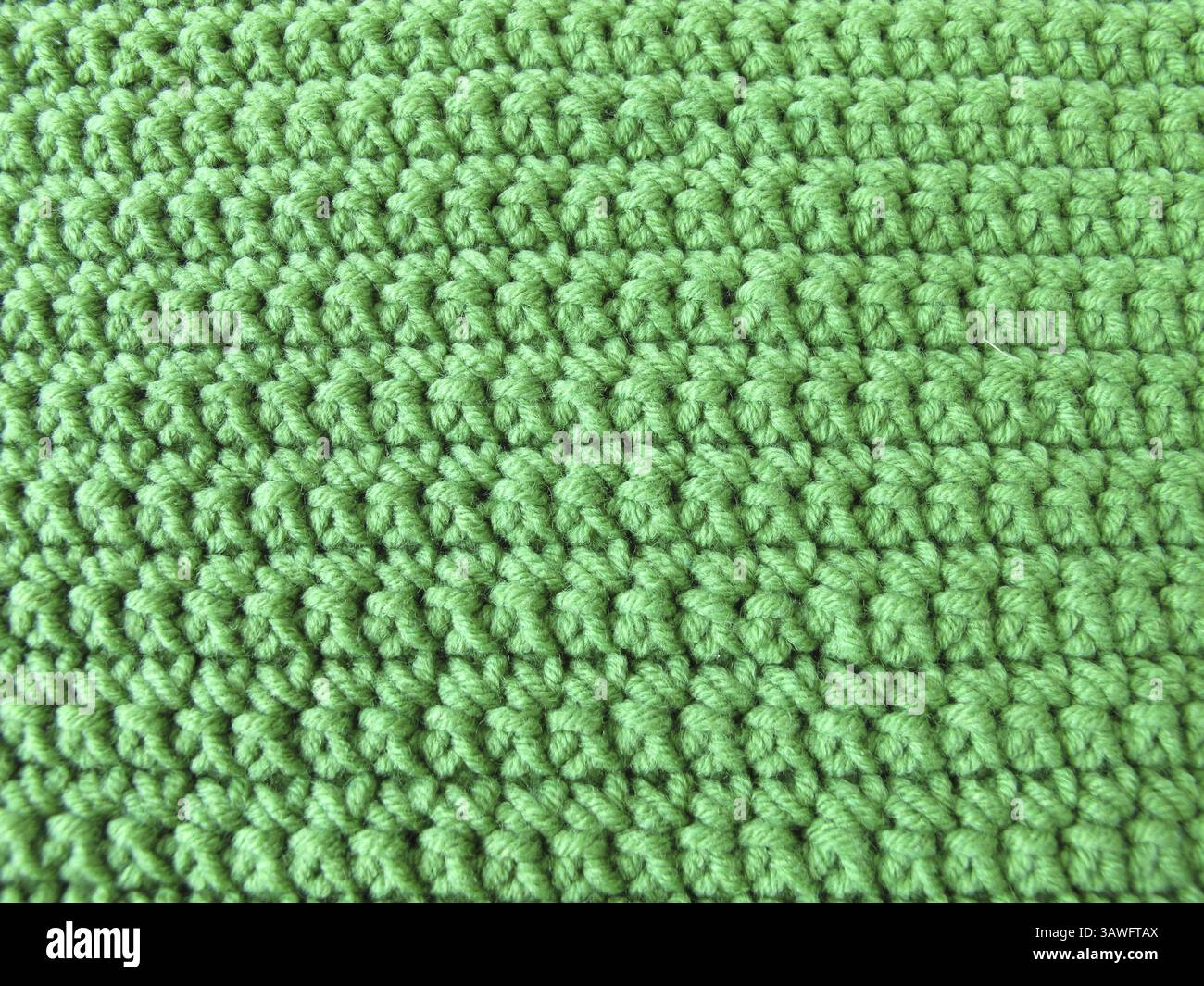 Crochet pattern with single crochet stitches in green Stock Photo - Alamy