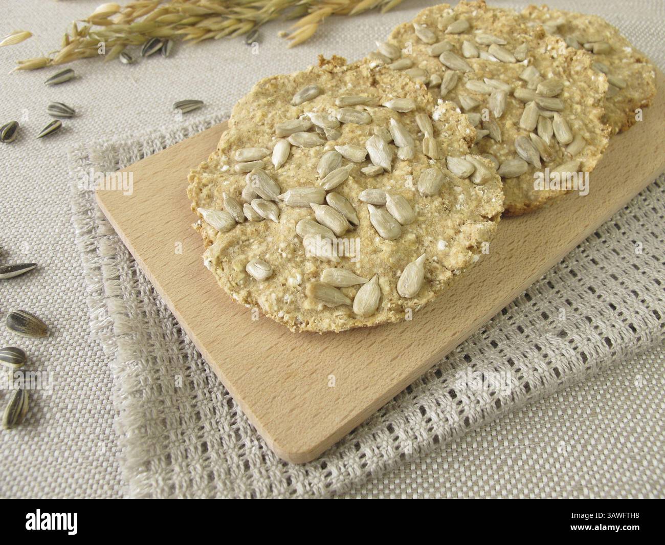 Round oat crispbread with sunflower seeds Stock Photo - Alamy