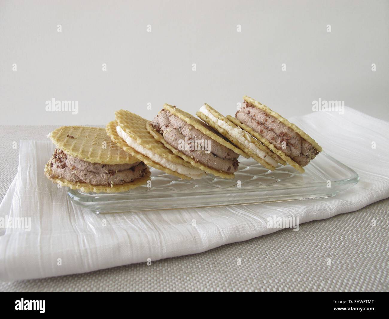 Wafer sheets filled with ice cream Stock Photo - Alamy