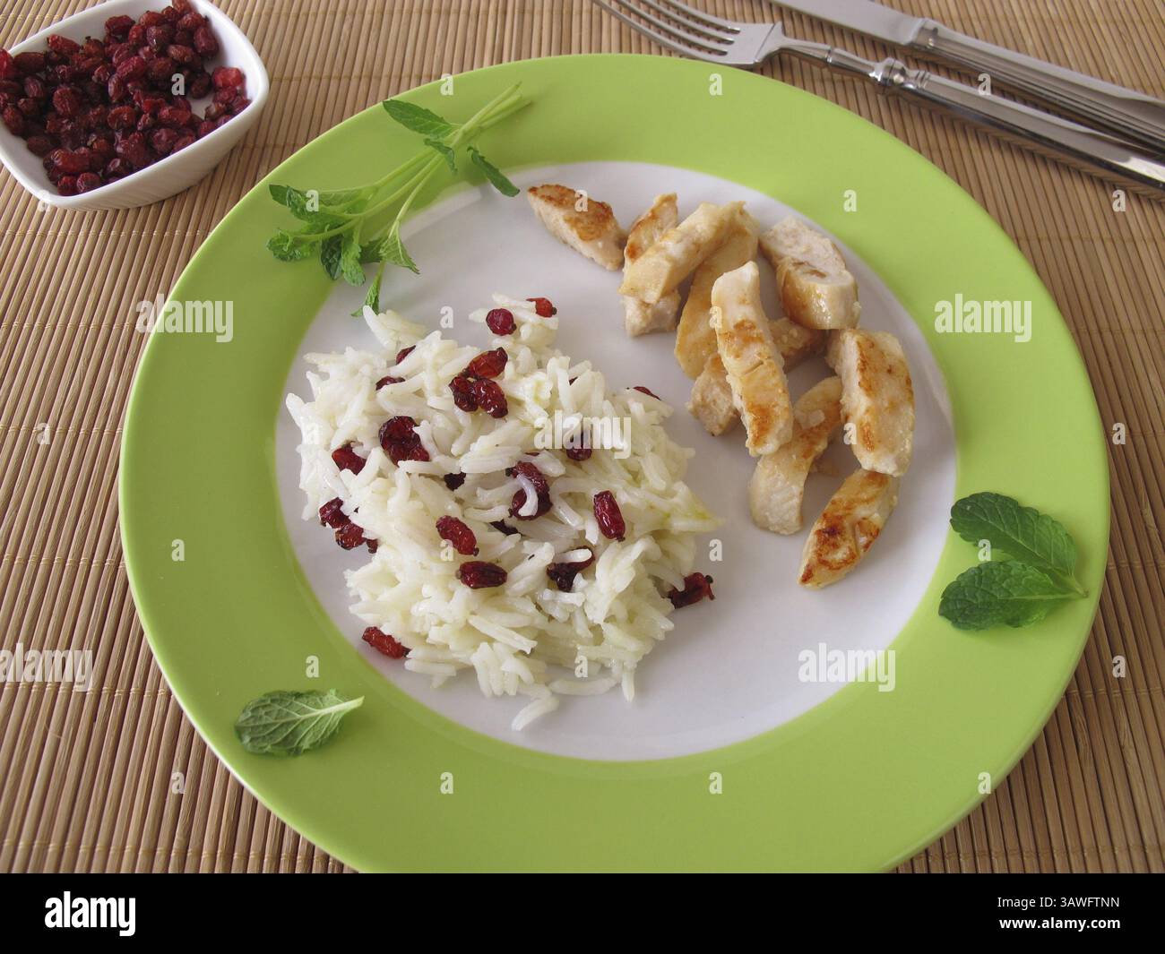Barberry rice with chicken Stock Photo - Alamy