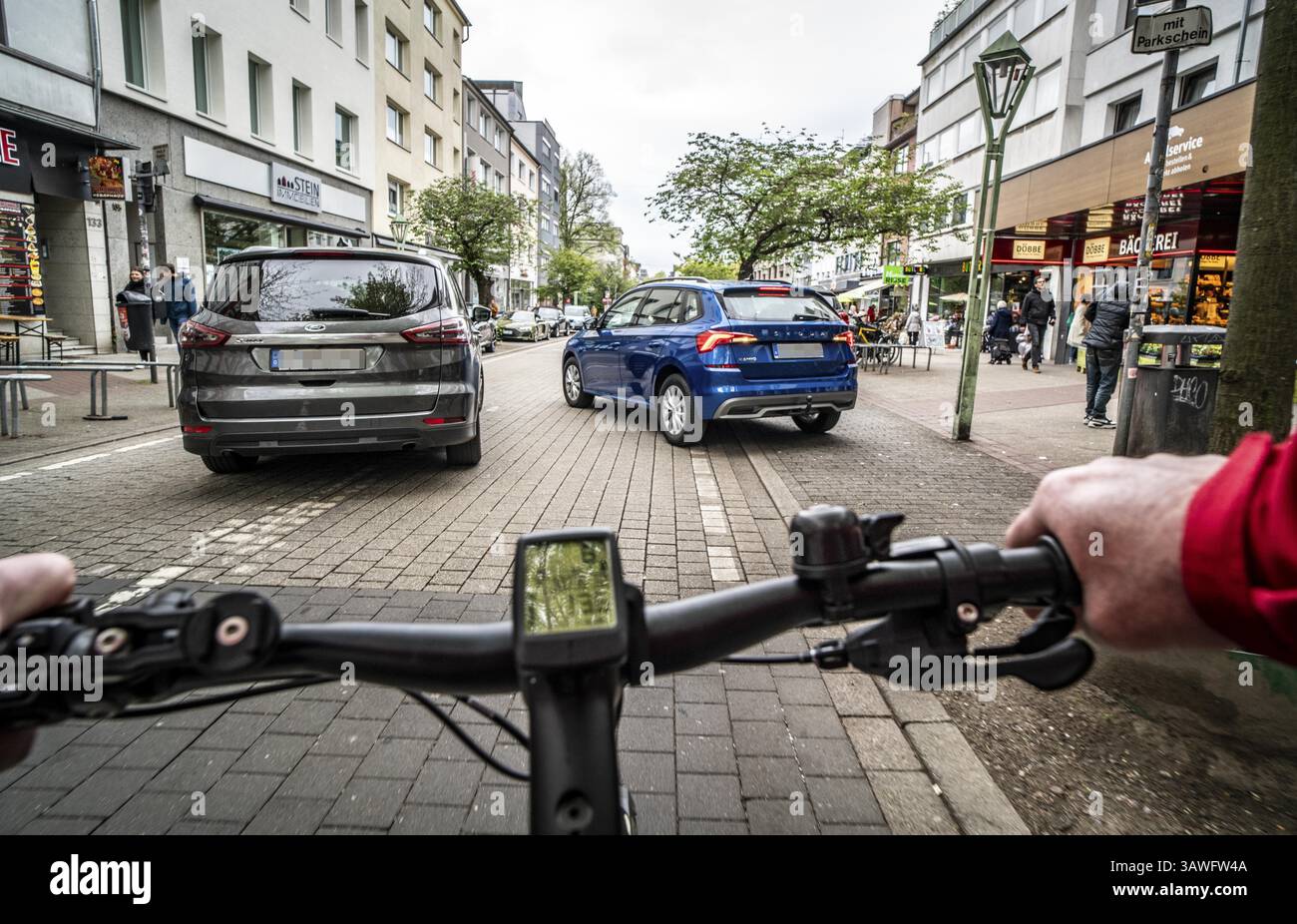 Cycling in the city, inner-city street, cycle lane, bicycles have ...