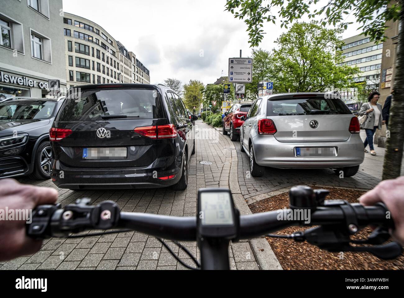Cycling in the city, inner-city street, cycle lane, bicycles have ...