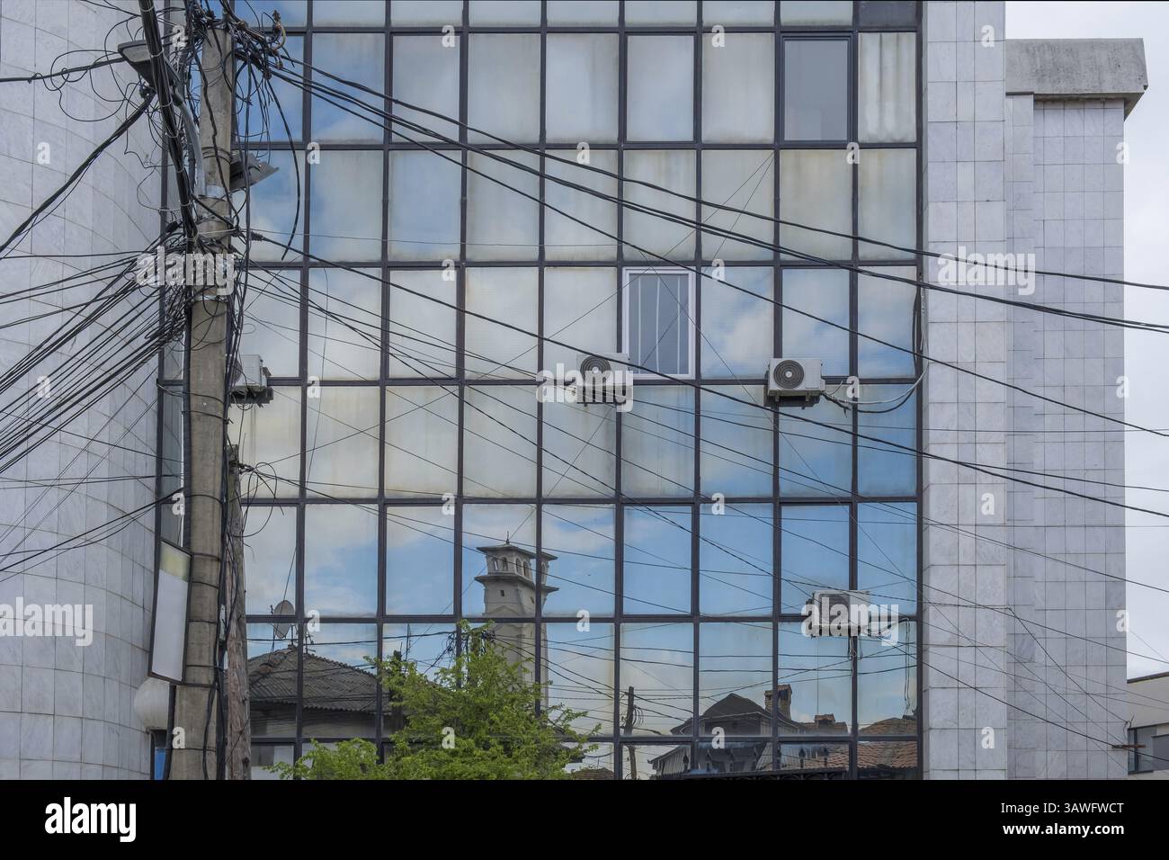 Chaotic installation of power and telecommunications cables on a ...