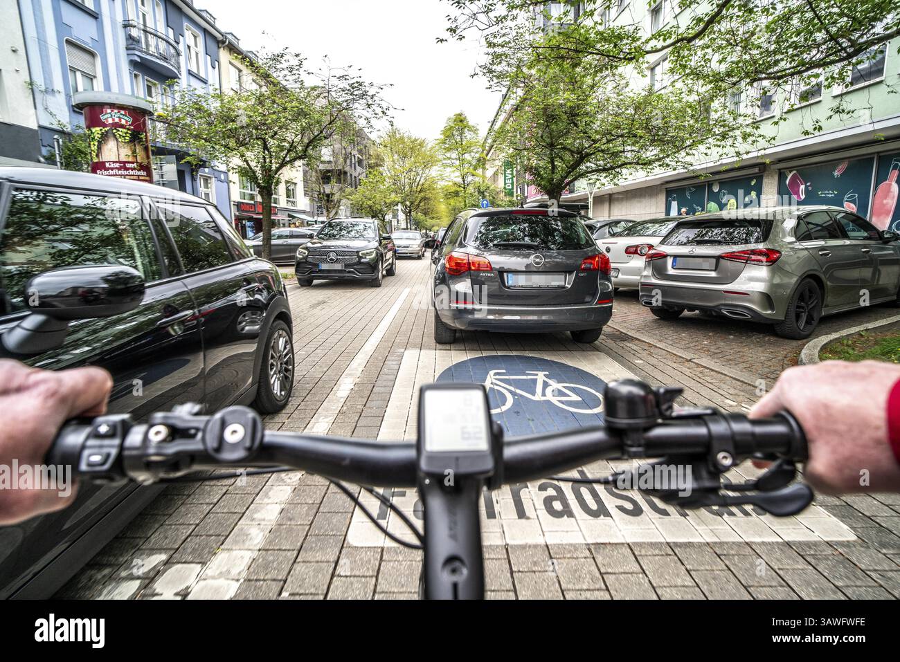 Cycling in the city, inner-city street, cycle lane, bicycles have ...