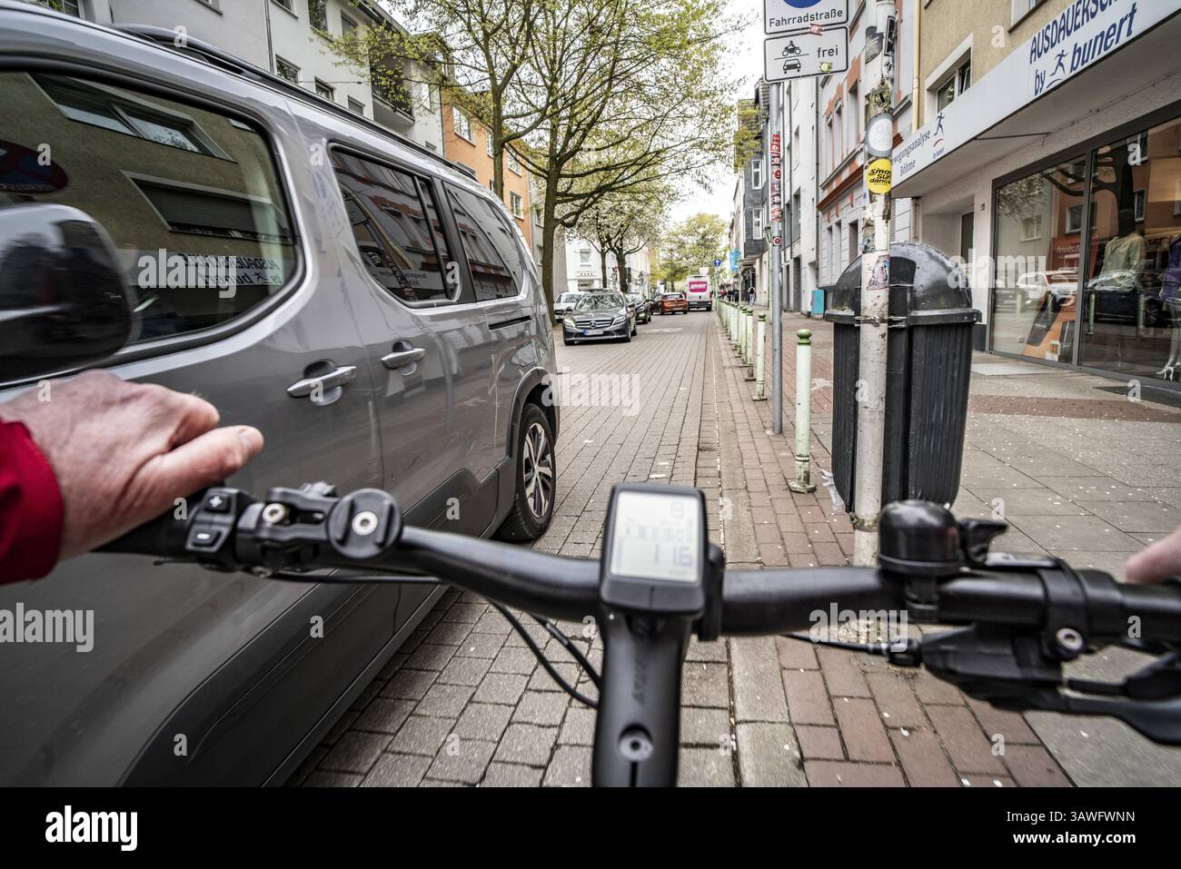 Cycling in the city, inner-city street, cycle lane, bicycles have ...